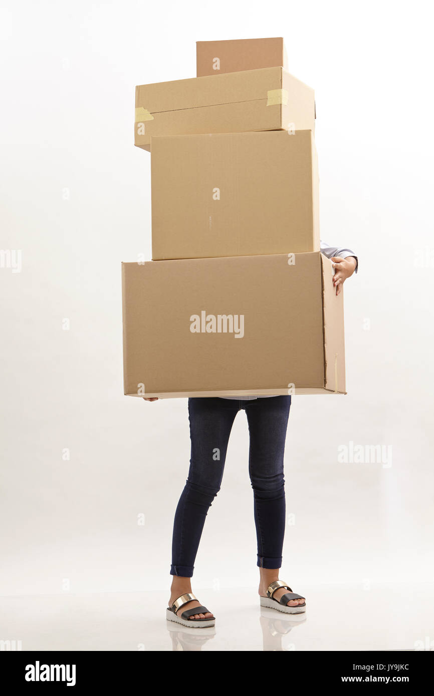 Woman carring box hi-res stock photography and images - Alamy