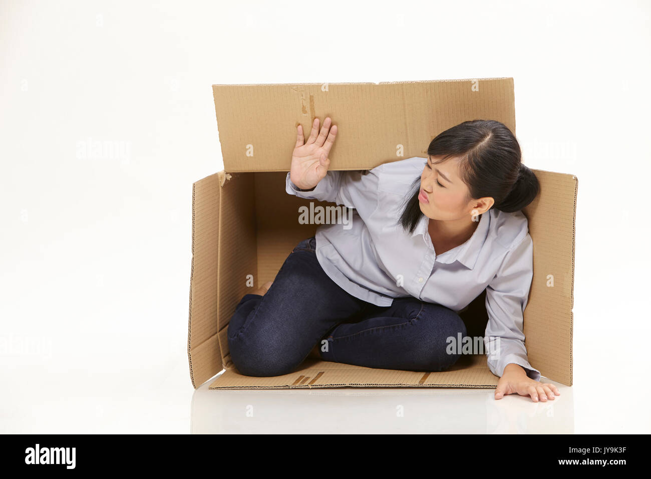 Woman trapped box hi-res stock photography and images - Alamy