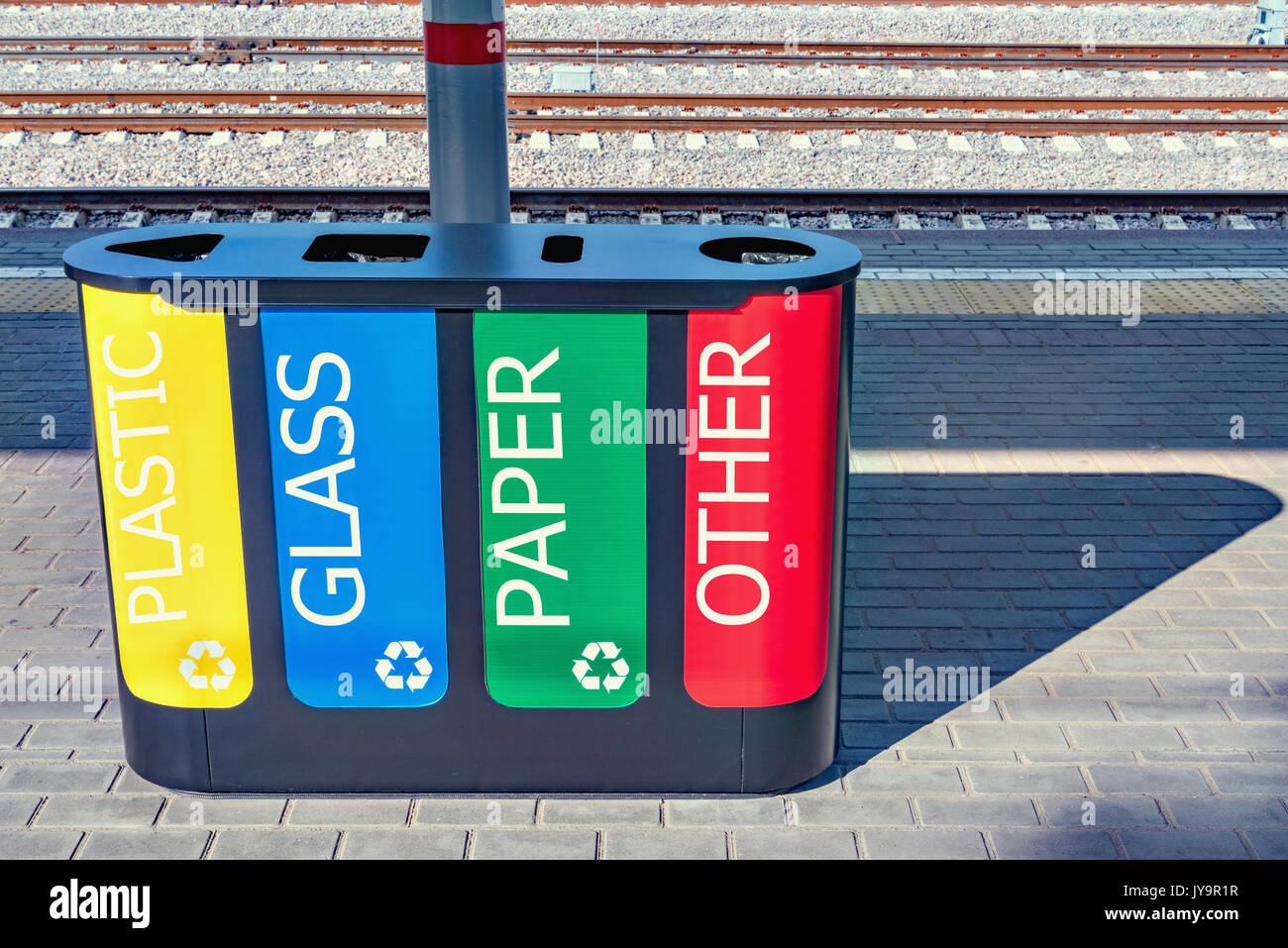 Multicolored bin for separate waste collection on the railway station ...