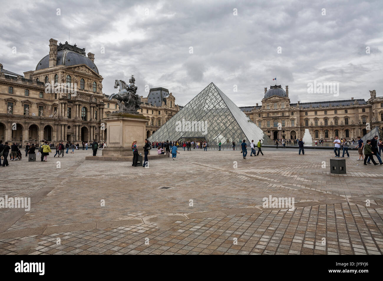 The Louvre Palace and Museum with its Pyramid Paris France Europe Stock ...