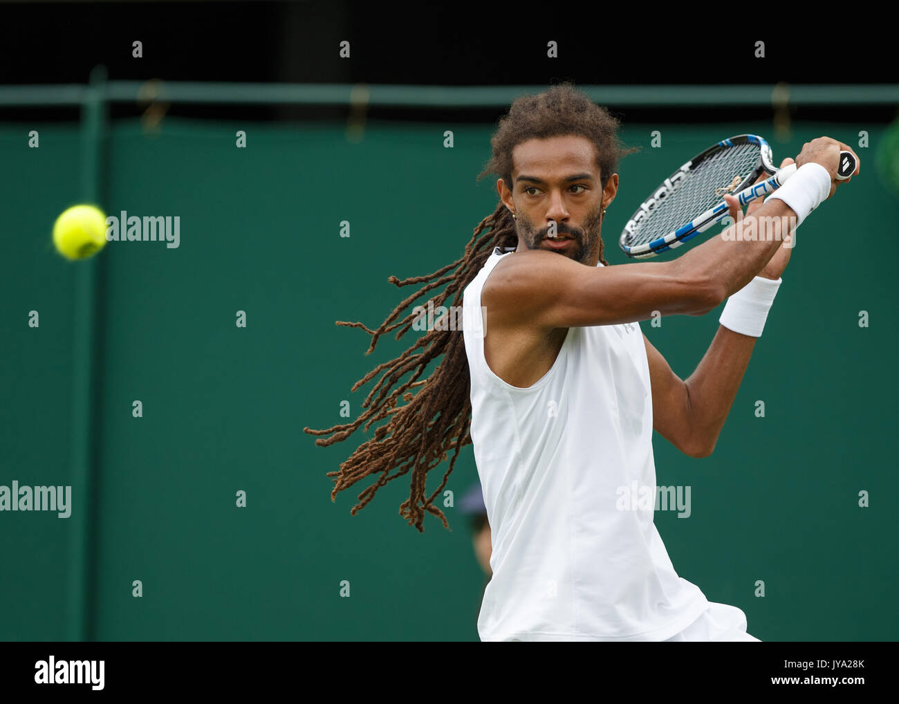 DUSTIN BROWN in action at Wimbledon Stock Photo - Alamy