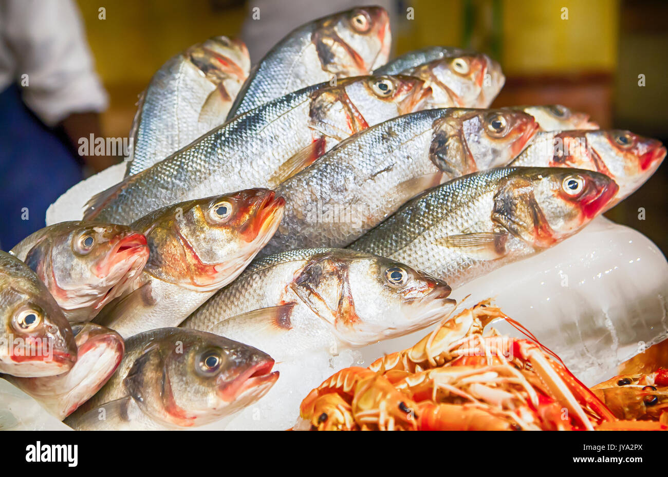 Fish on sale in indoor food market Stock Photo - Alamy