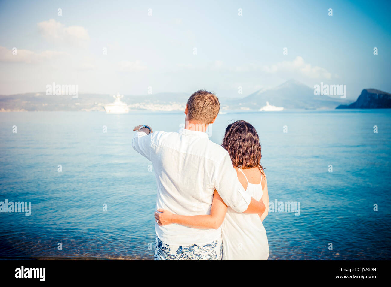 Back View Two Women Hug Beach High Resolution Stock Photography and ...