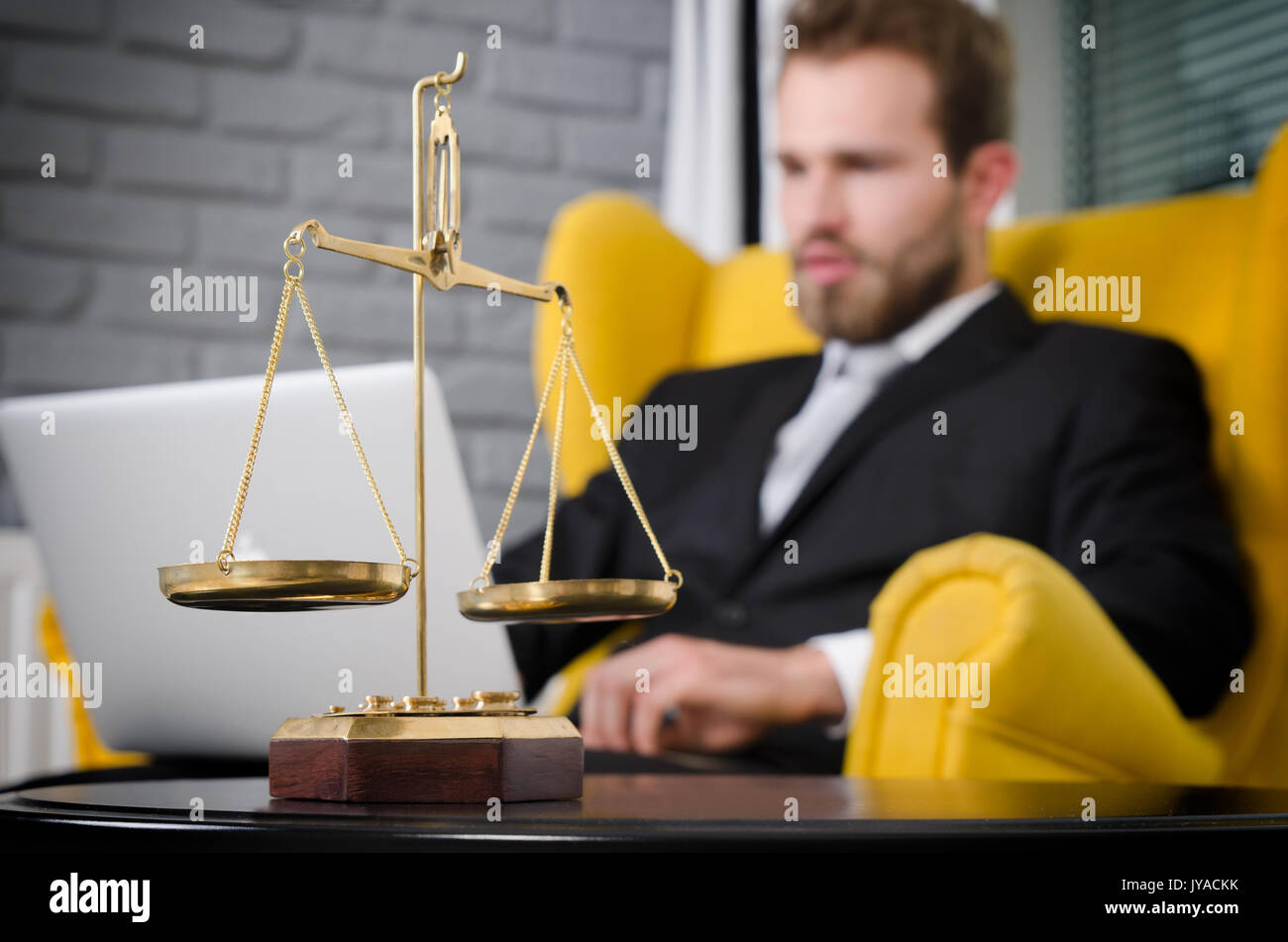 Weight scale of justice, lawyer in background. lawyer document ...