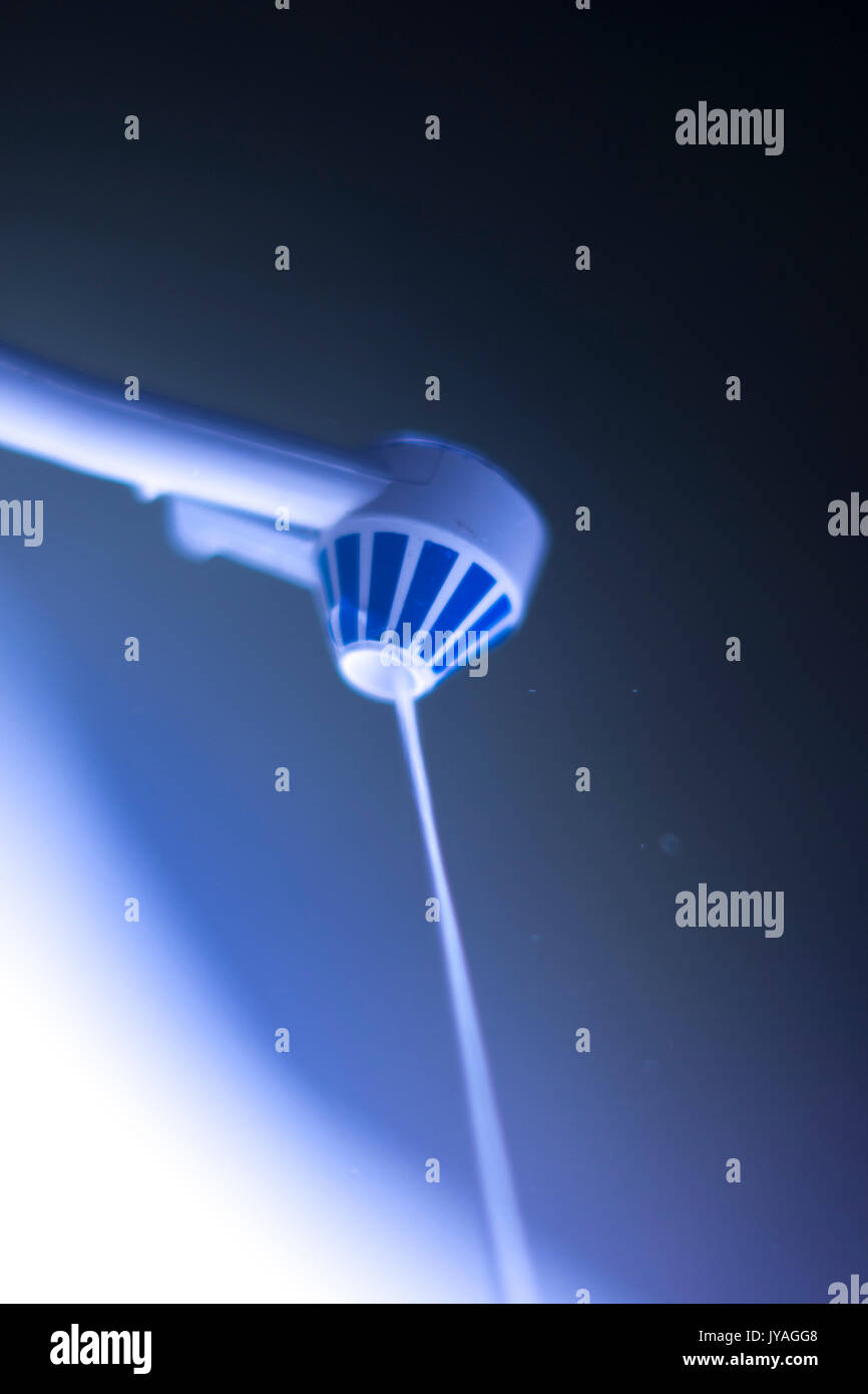 Dental water spray cleaner for interdental hygiene Stock Photo - Alamy