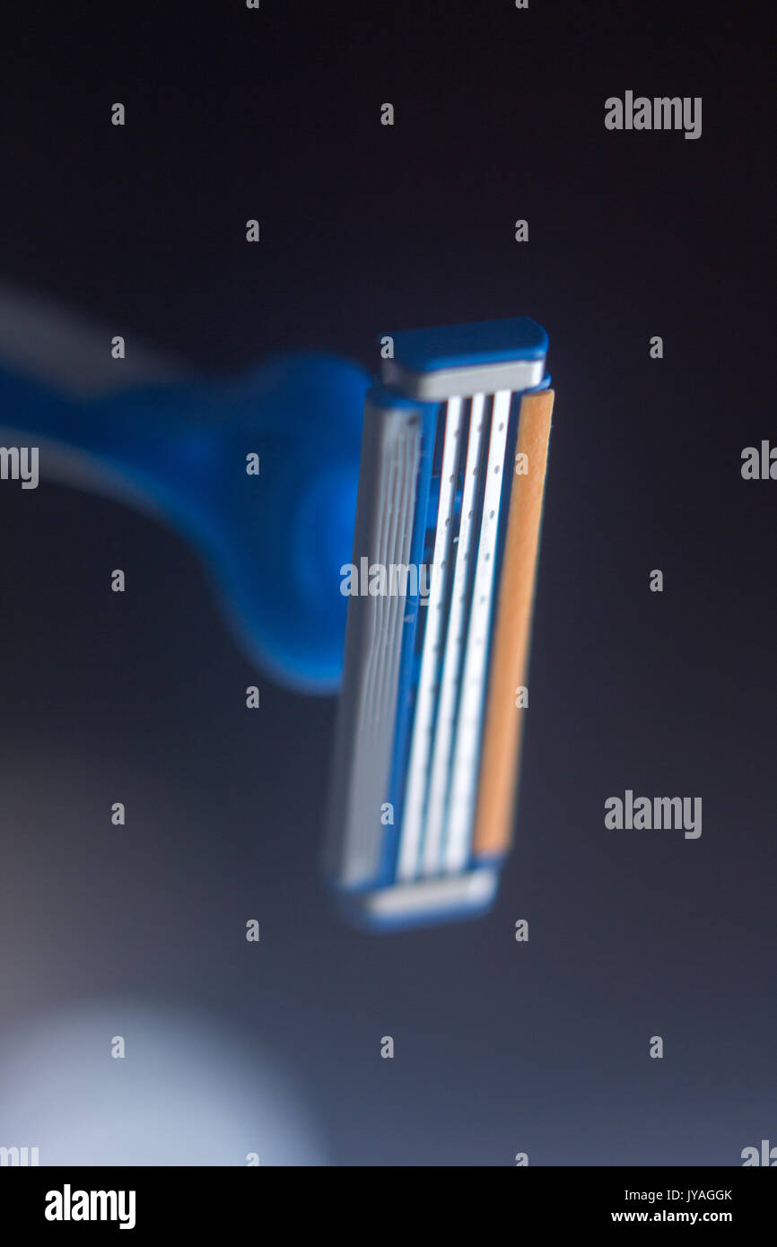 Modern safety disposable plastic shaving razor with multiple blades and ...