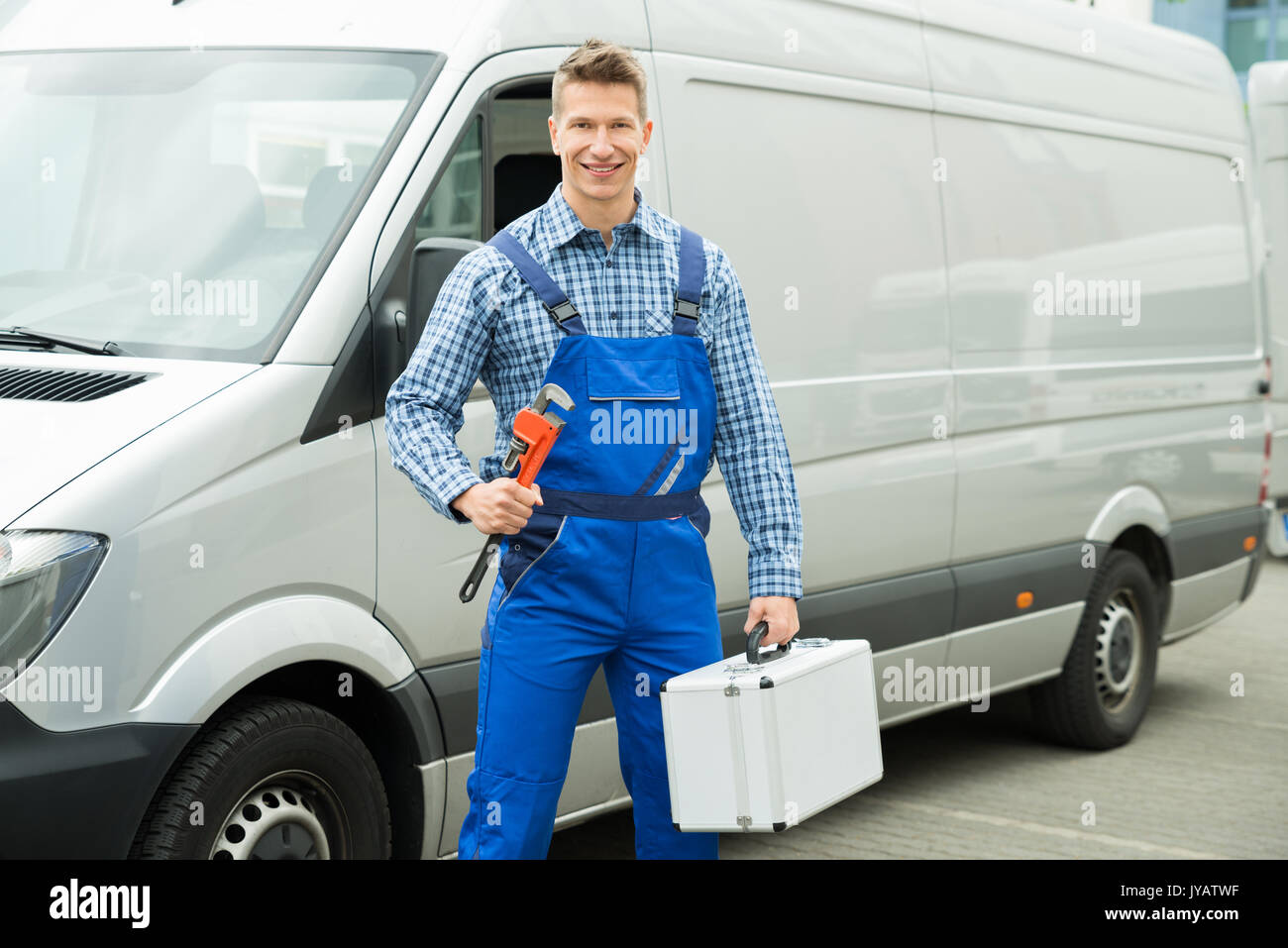 Happy Male Worker With Work Tool And Toolbox In Front Of Van Stock ...