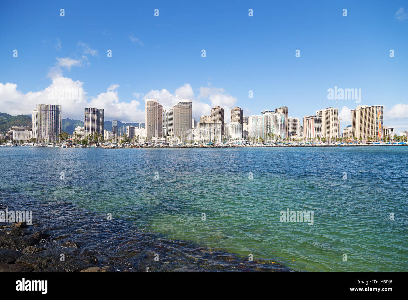 Urban panorama of Waikiki waterfront with buildings and marina. A view ...