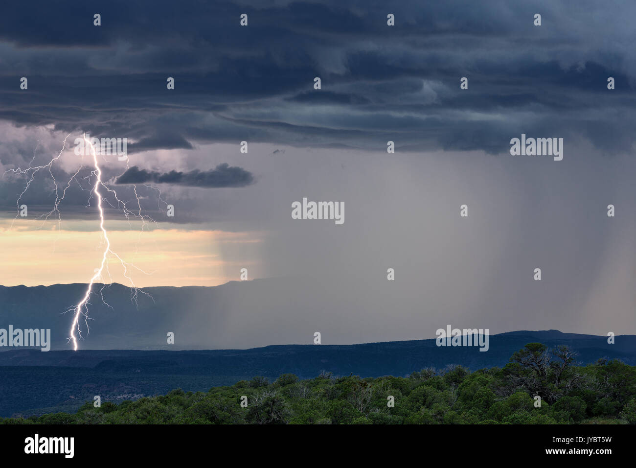 Powerful lightning bolt strike and heavy rain from a monsoon ...