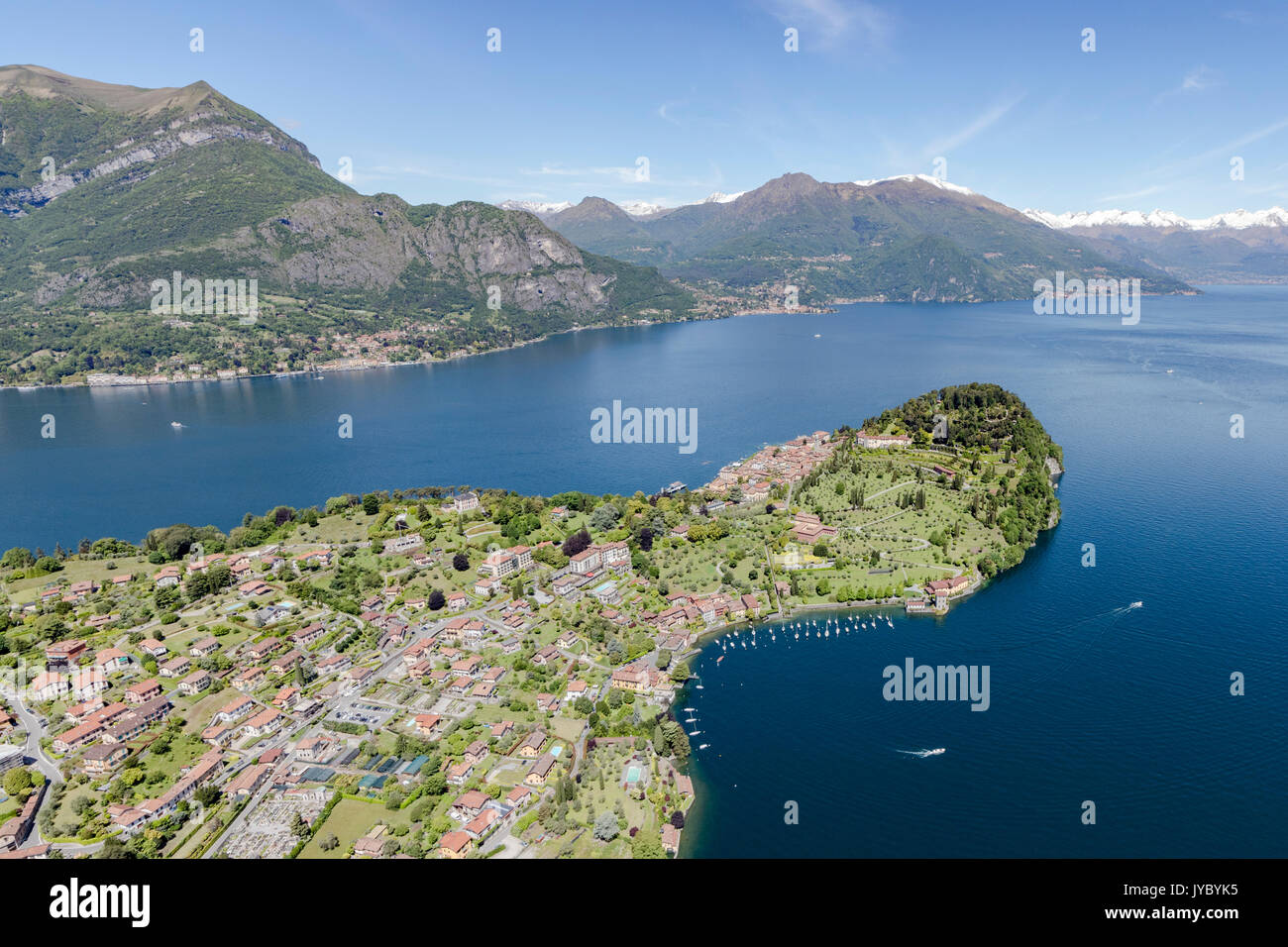 Aerial view of the village of Bellagio frames by the blue water of Lake ...