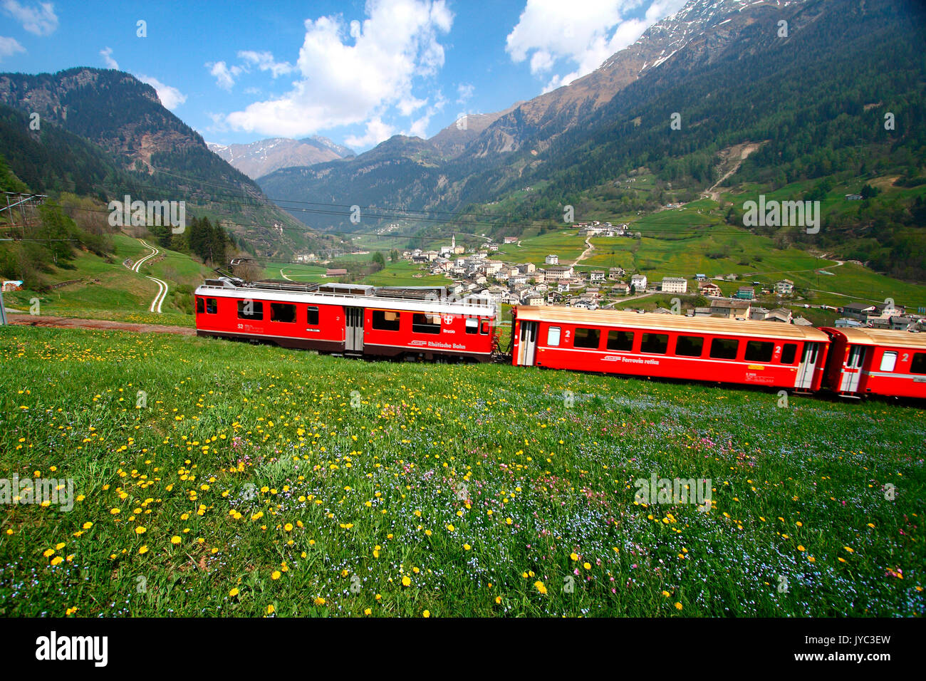 The Bernina Express passing by the village of Privilasco, Val Poschiavo ...