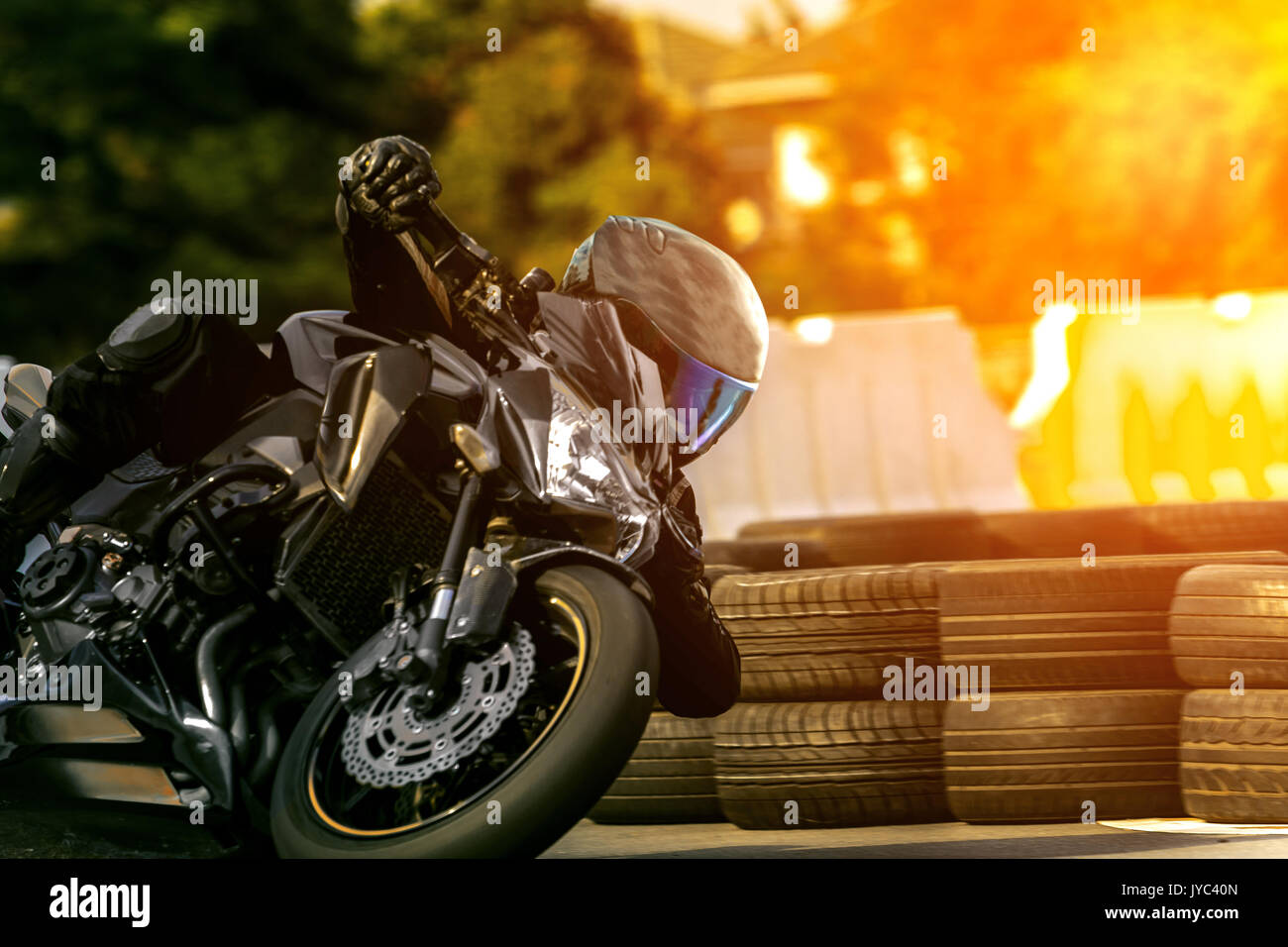 man riding sport motorcycle on racing track Stock Photo - Alamy