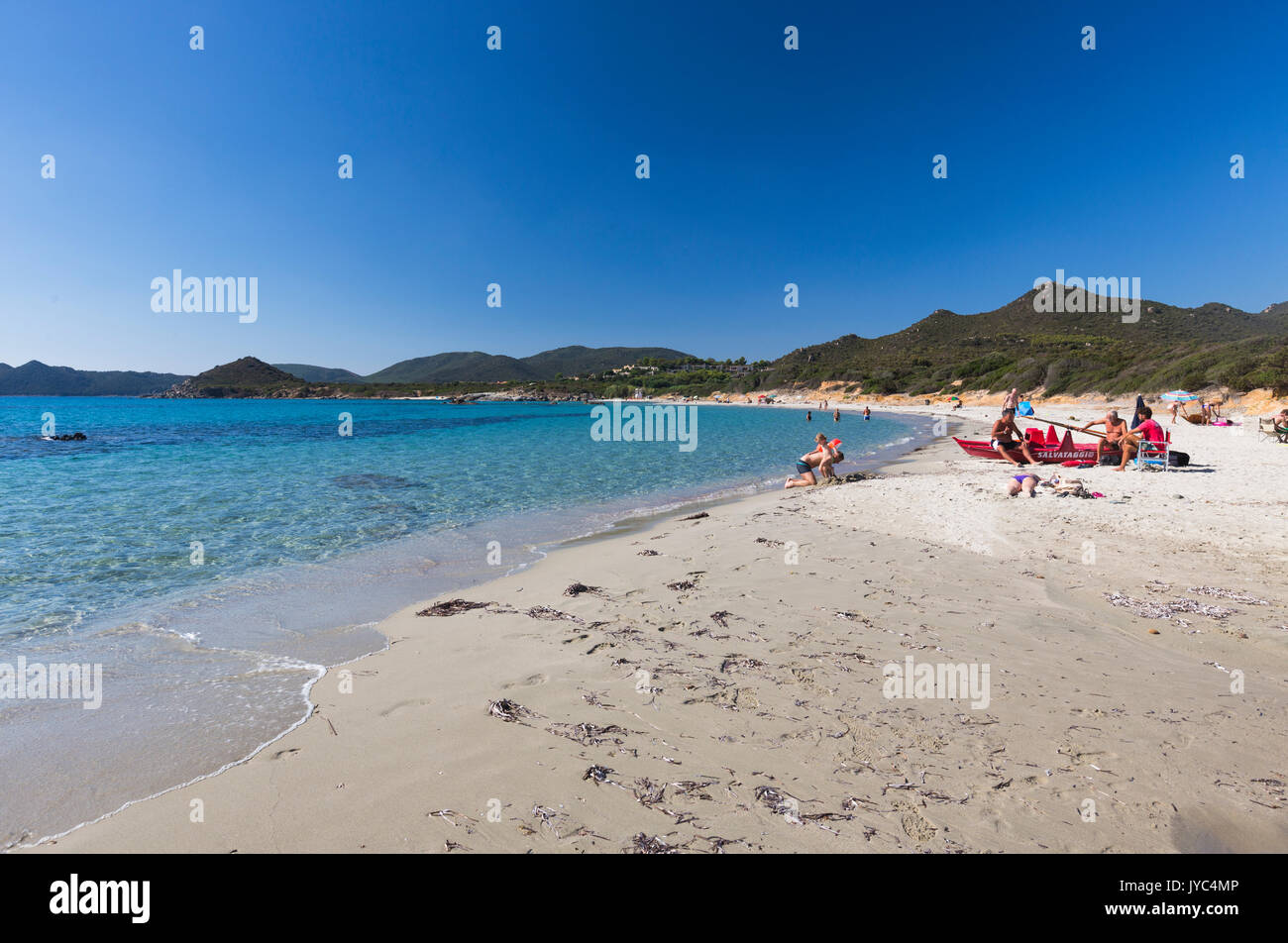 The crystal turquoise water of the sea frames the sandy beach Sant Elmo ...