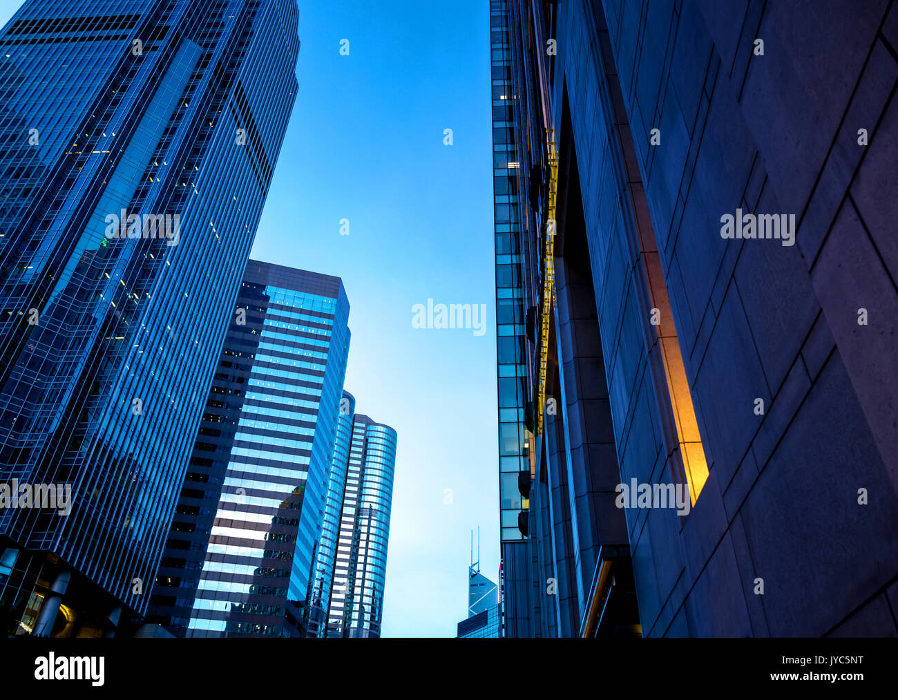 Commercial buildings at night in Hong Kong Stock Photo - Alamy