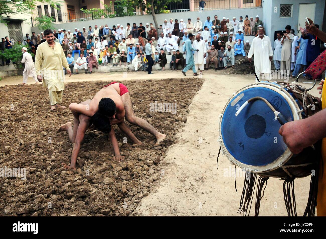 Rawalpindi, Pakistan. 18th Aug, 2017. Wrestlers in action during ...