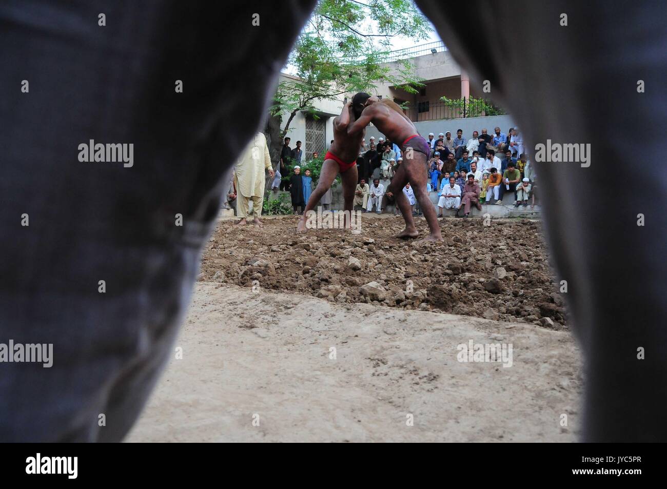 Rawalpindi, Pakistan. 18th Aug, 2017. Wrestlers in action during ...