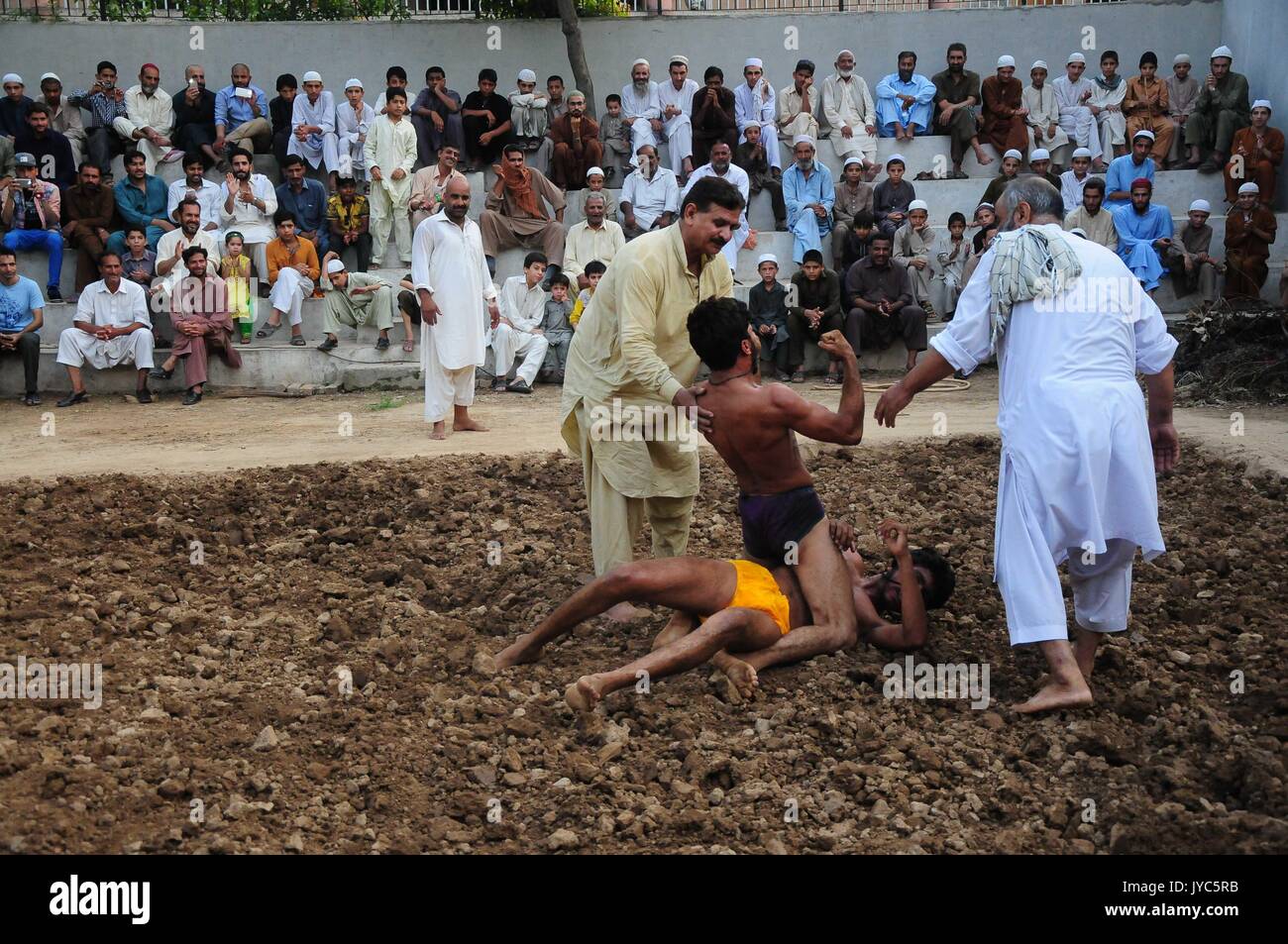 Rawalpindi, Pakistan. 18th Aug, 2017. Wrestlers in action during ...