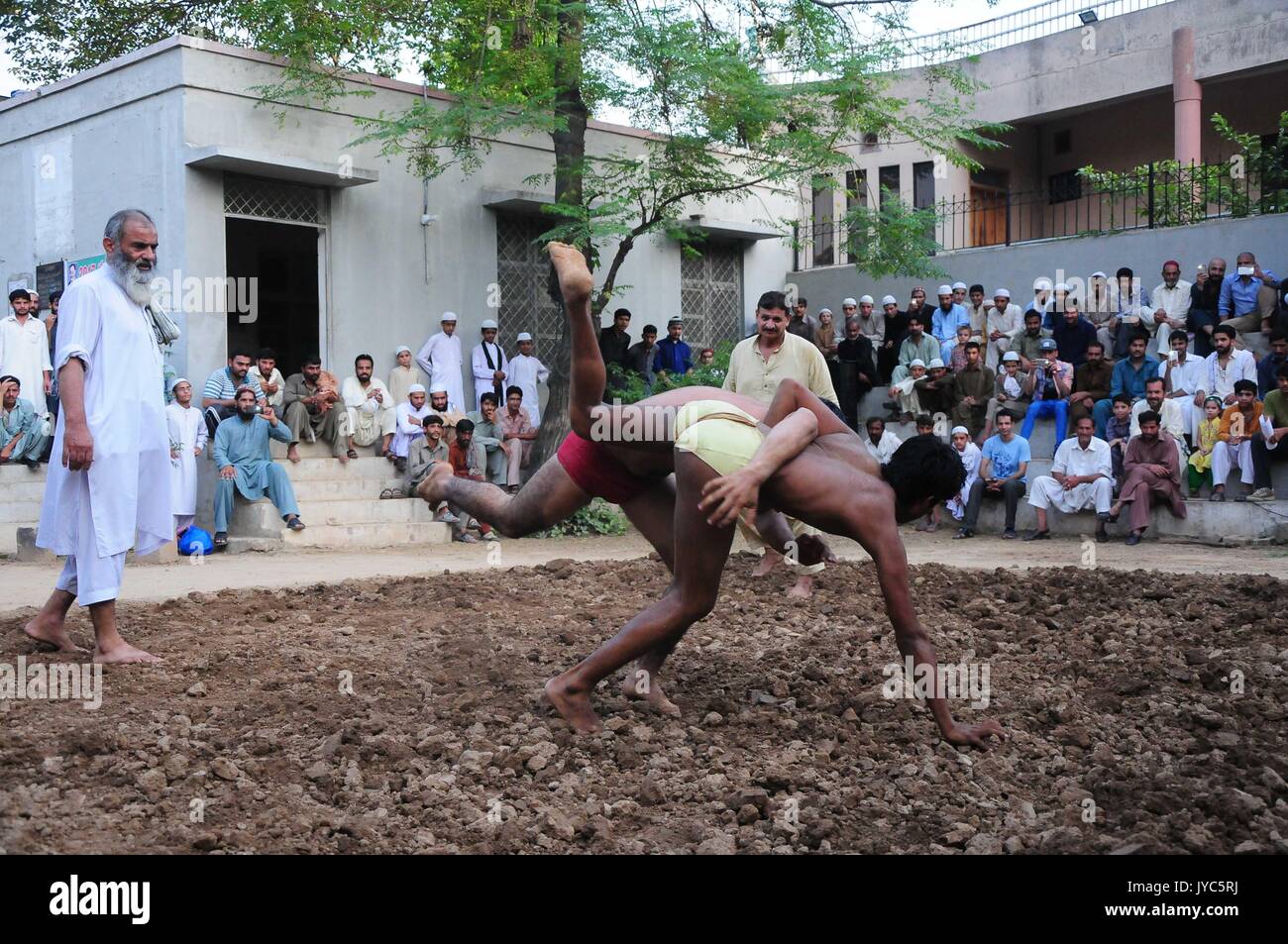 Rawalpindi, Pakistan. 18th Aug, 2017. Wrestlers in action during ...
