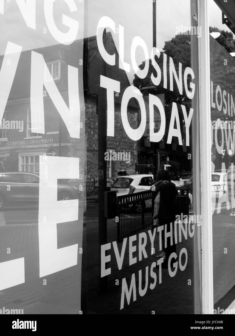 Store closing posters display in shop window Black and White Stock ...