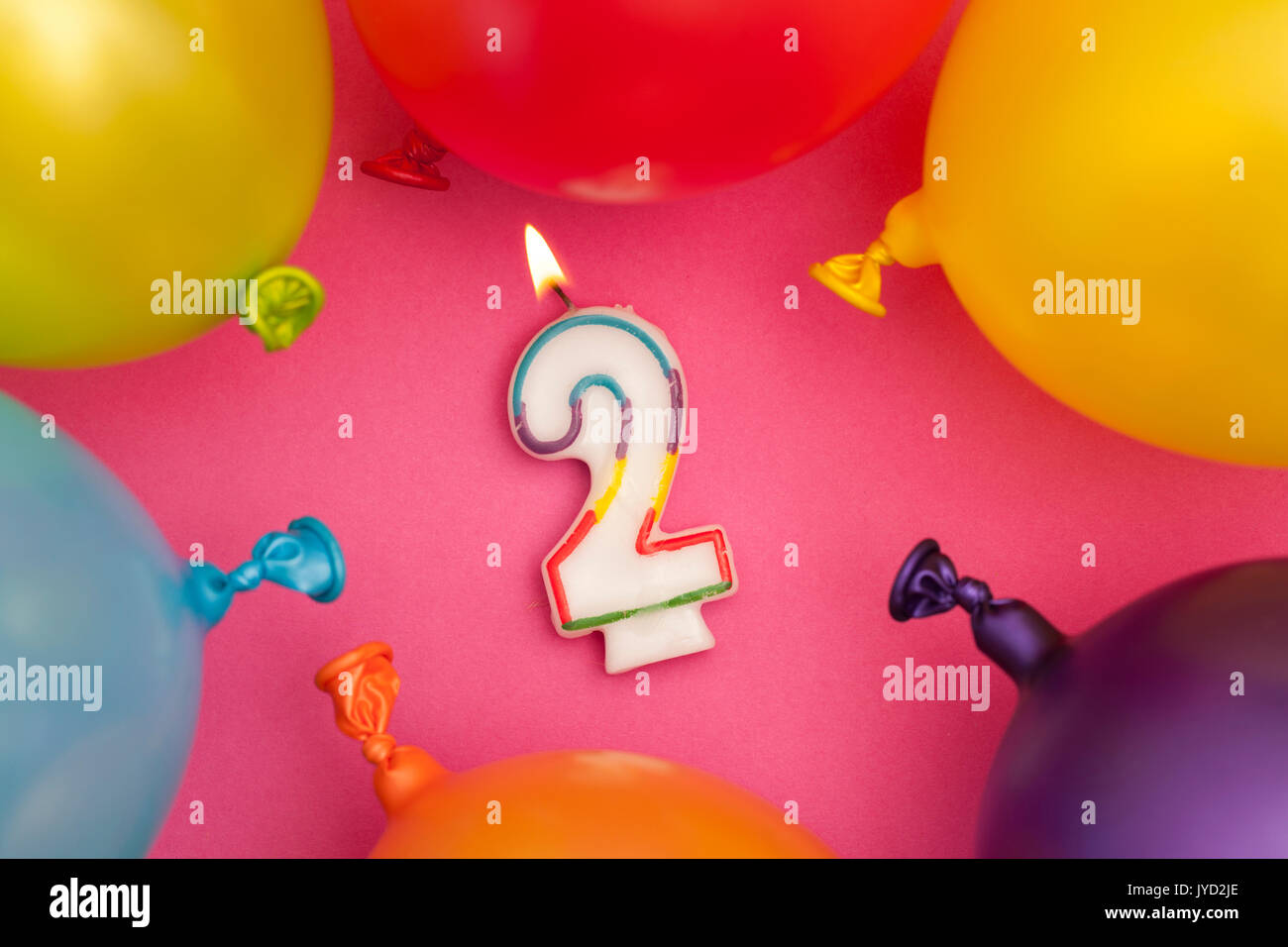 Happy Birthday number 2 celebration candle with colorful balloons Stock ...