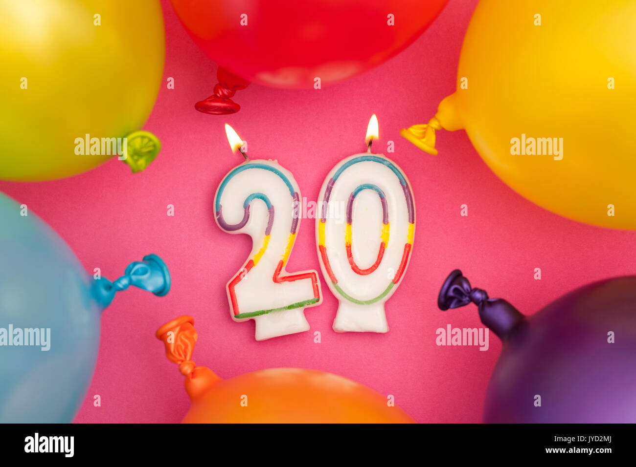 Happy Birthday number 20 celebration candle with colorful balloons ...