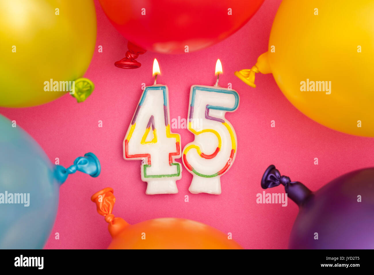 Happy Birthday number 45 celebration candle with colorful balloons ...