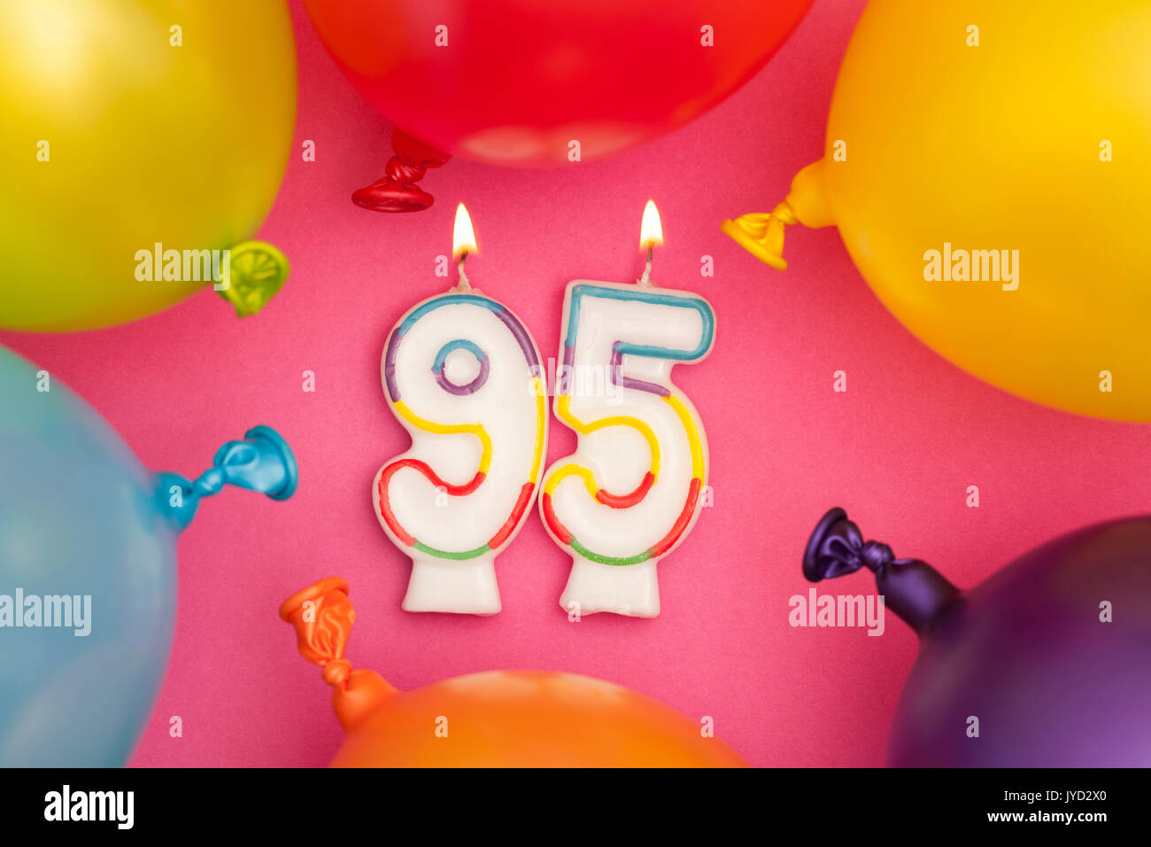 Happy Birthday number 95 celebration candle with colorful balloons ...