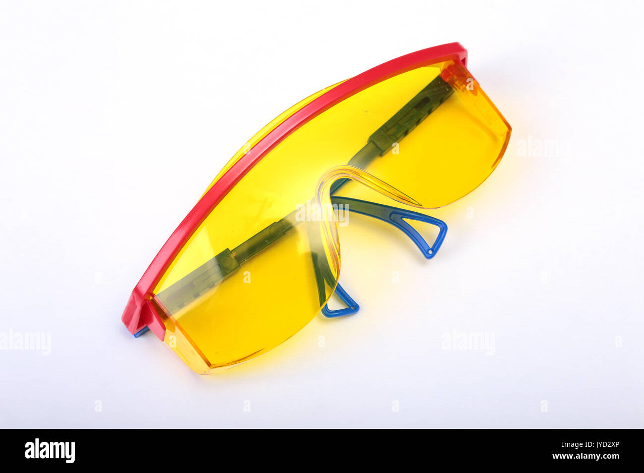 safety glasses for work. Eye protection during operation on a white ...