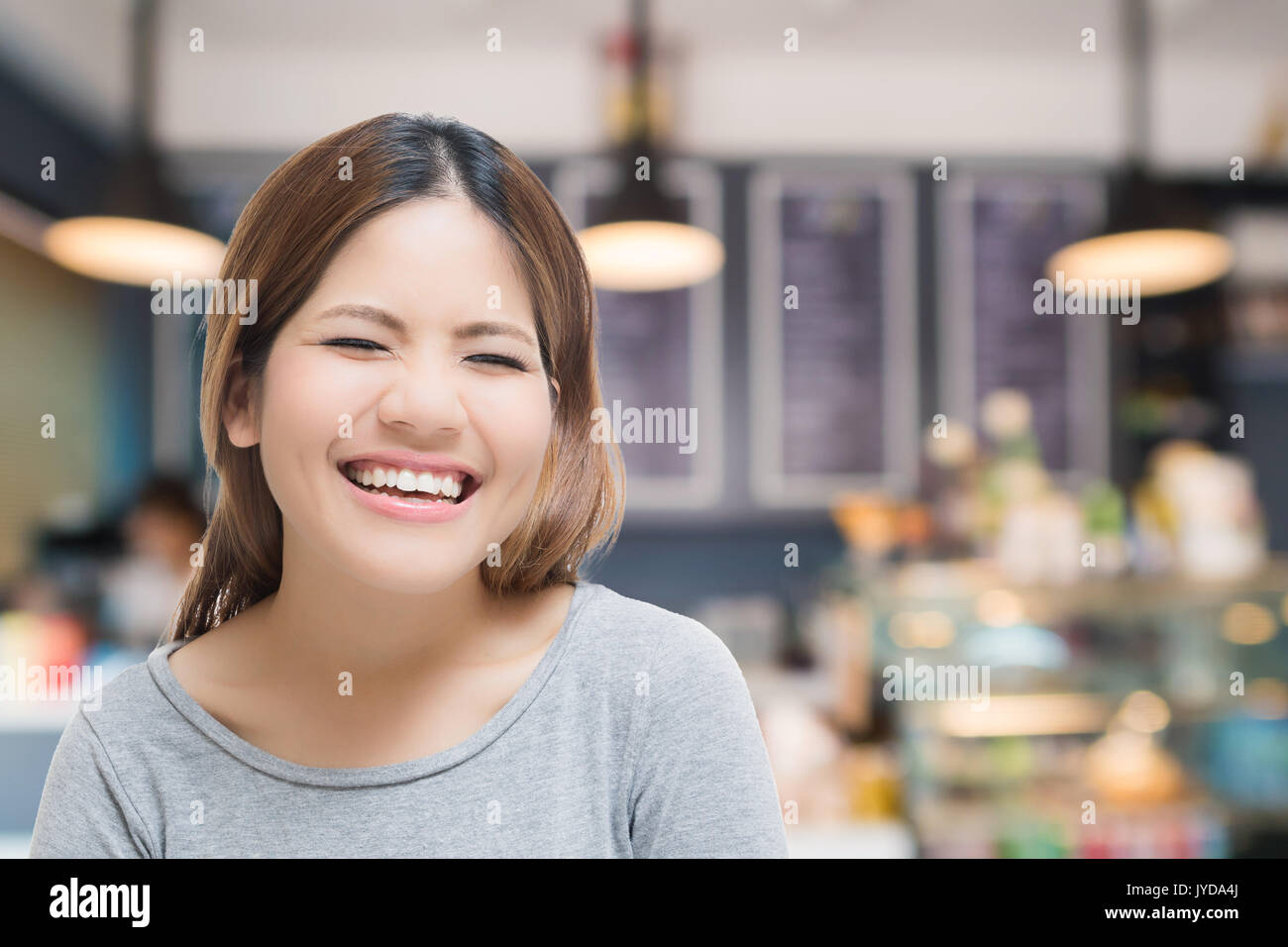 Bakery shop interior woman hi-res stock photography and images - Alamy