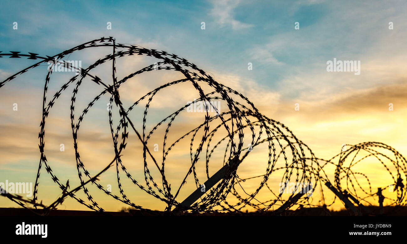 Steel razor wire perimeter fence hi-res stock photography and images ...
