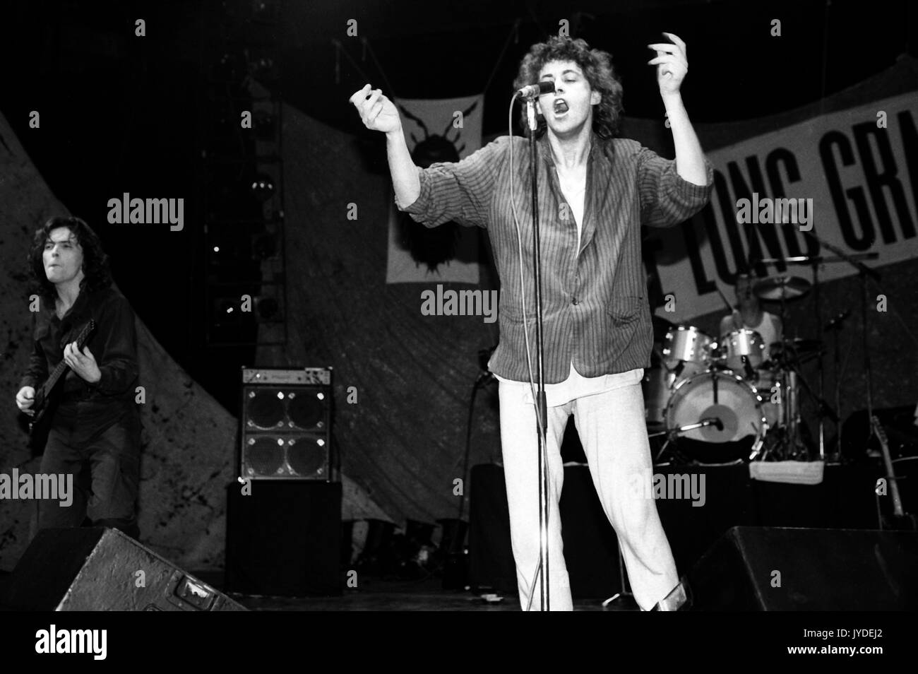Pete Briquette, Bob Geldof and Simon Crowe of The Boomtown Rats perform ...