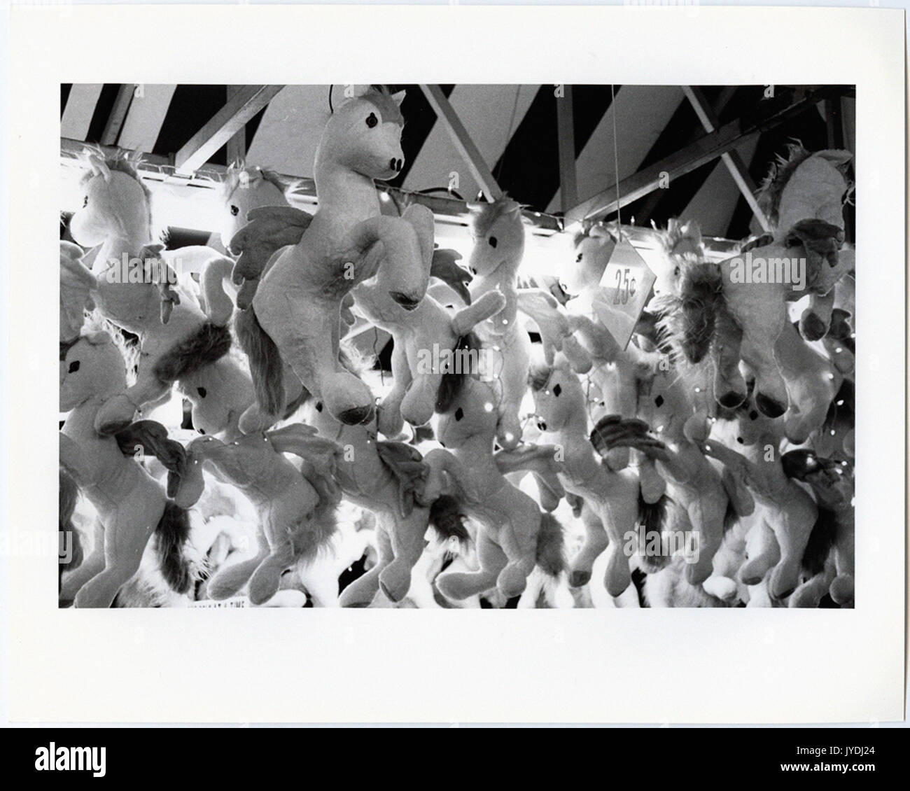 Stuffed pony prizes hang from game booth, State Fair of Texas Stock ...