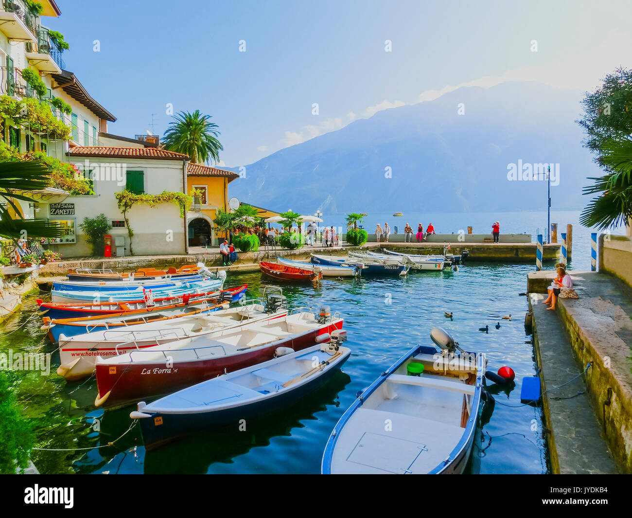 Limone sul Garda, Italy - September 21, 2014: The boardwalk with houses ...