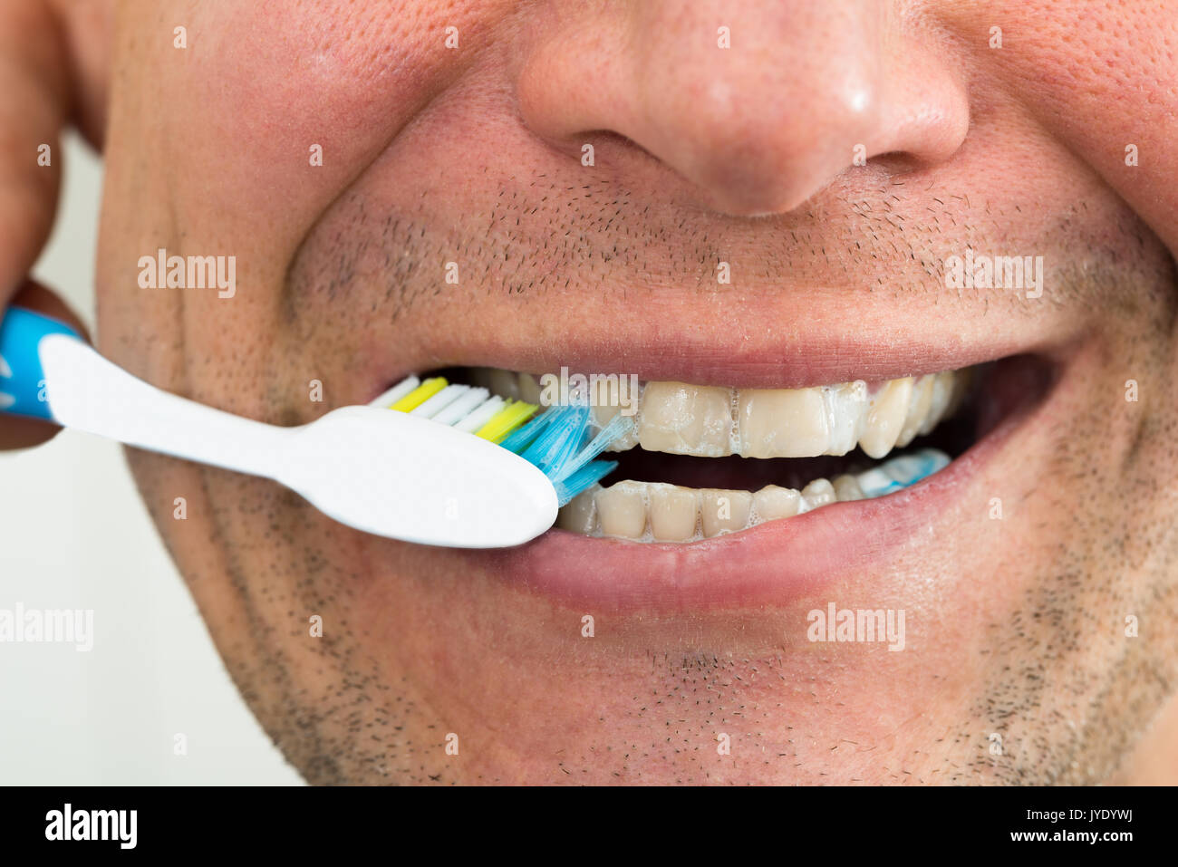 Close-up Photo Of A Man Brushing Teeth Stock Photo - Alamy