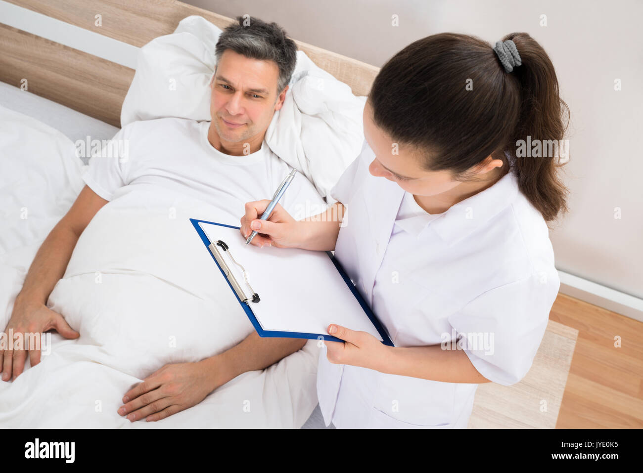 Medical records doctor writing on hi-res stock photography and images ...
