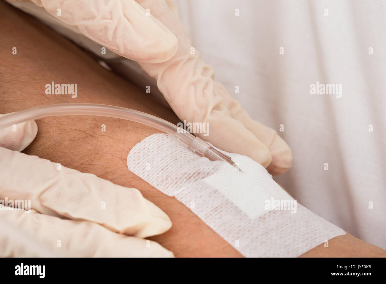 Intravenous drip hand hi-res stock photography and images - Alamy