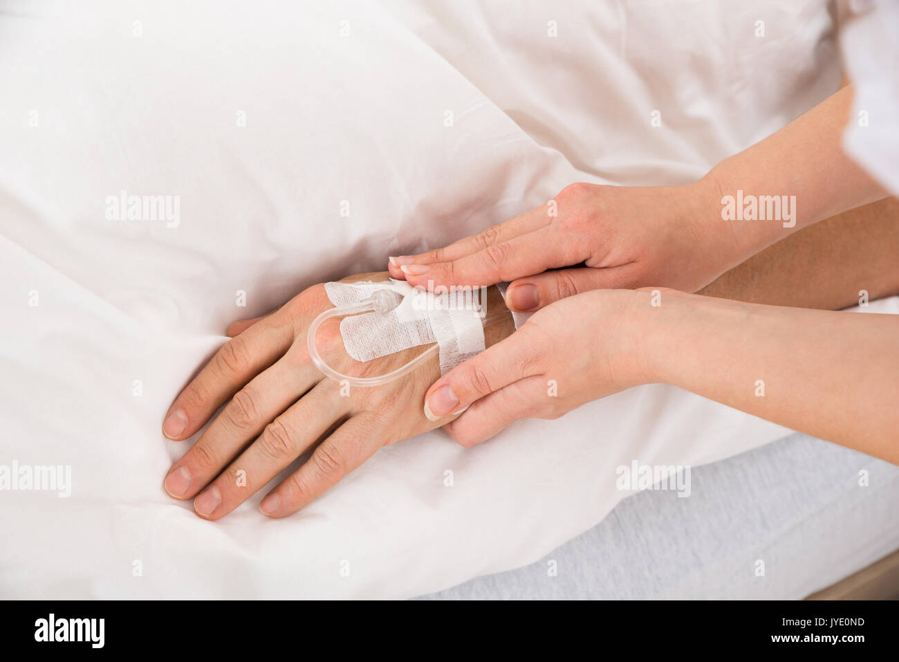 Medical drip hand hi-res stock photography and images - Alamy
