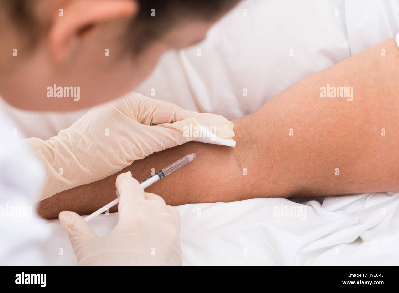Male doctor vaccine injection patient hi-res stock photography and ...