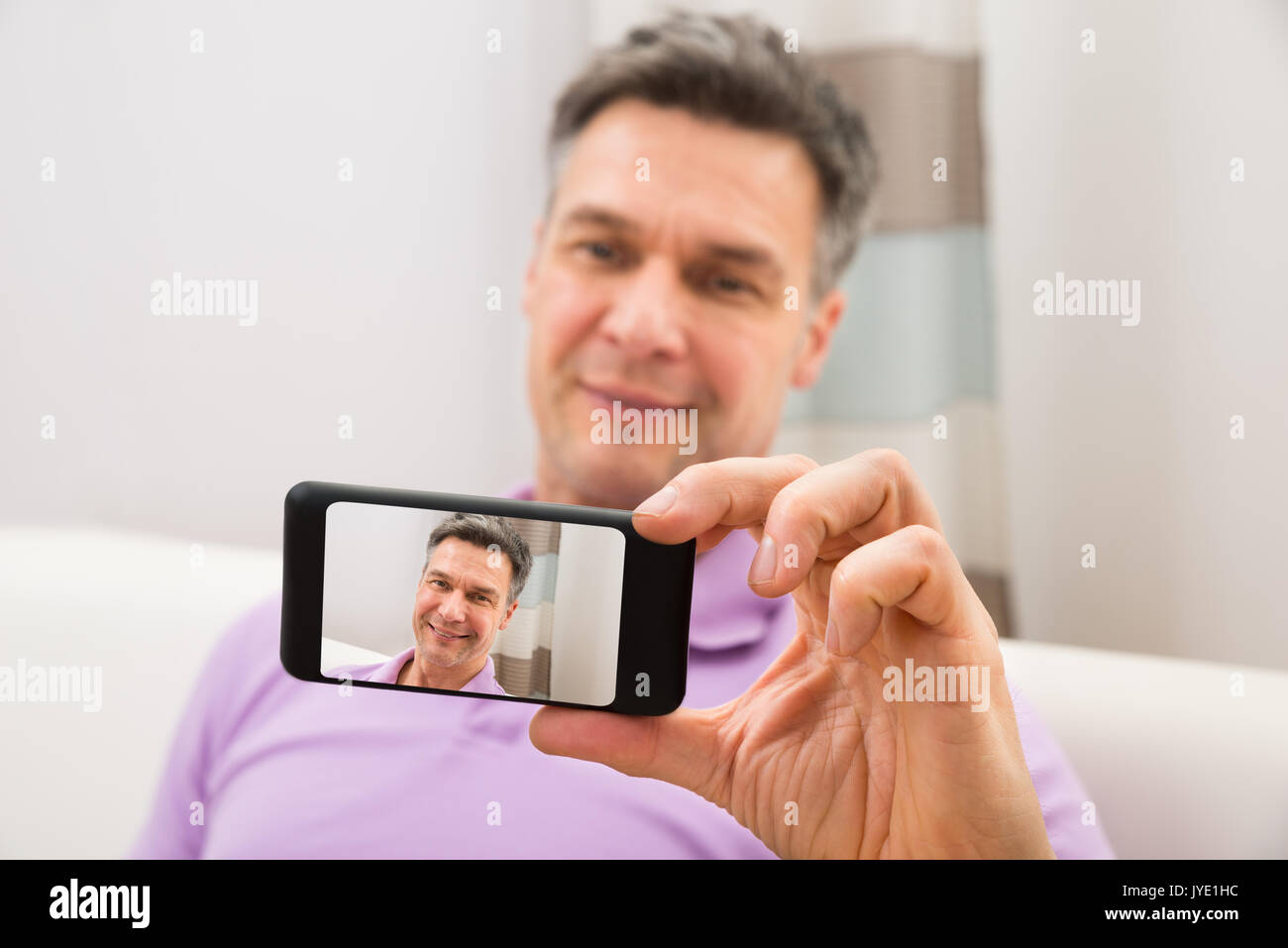 Joyful portrait man indoors hi-res stock photography and images - Alamy