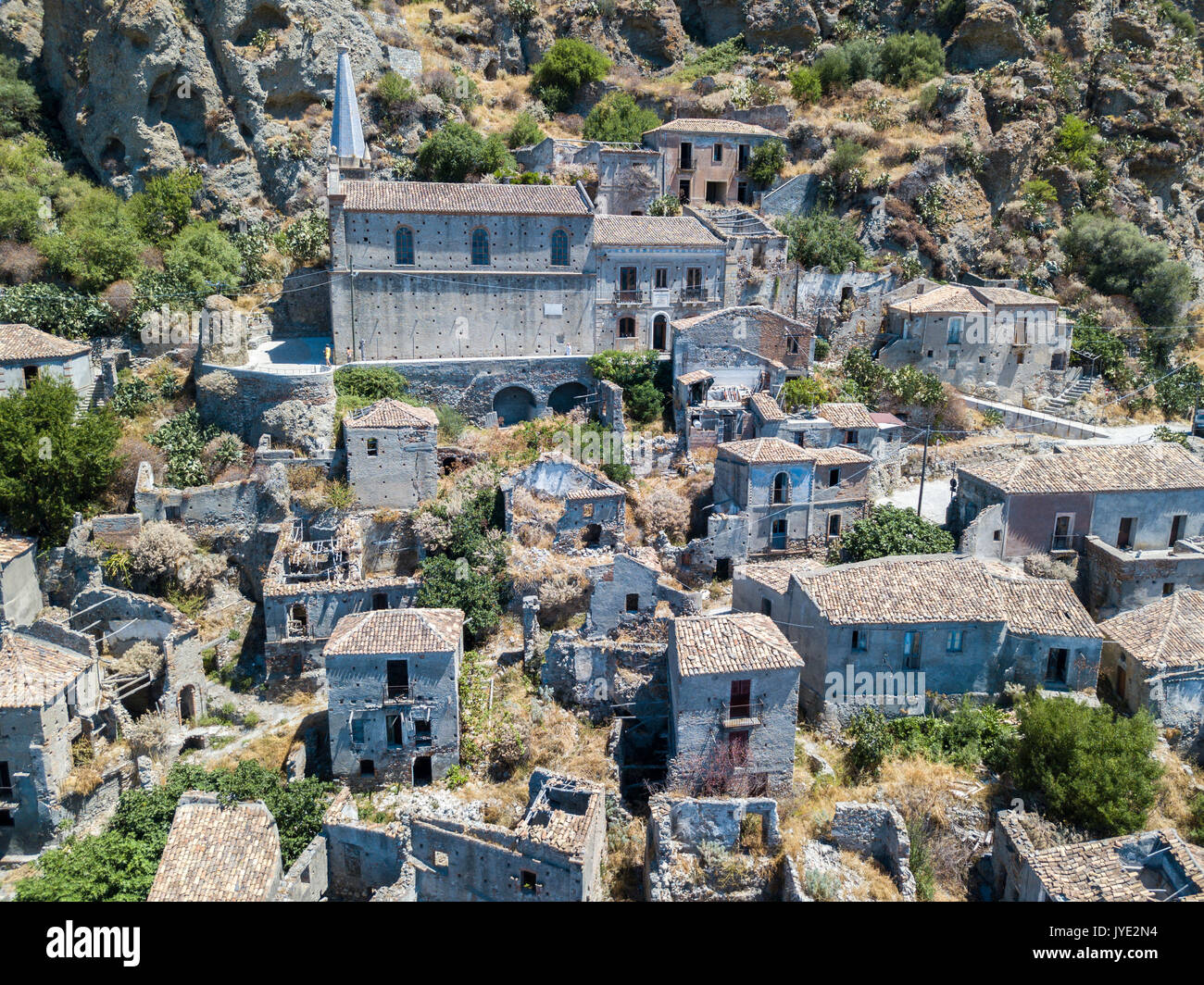 Aerial view of the Small village of Pentedattilo, church and ruins of ...