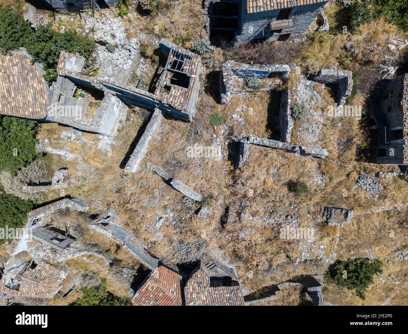 Aerial view of the Small village of Pentedattilo, church and ruins of ...