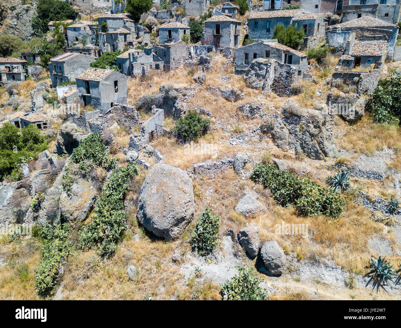 Aerial view of the Small village of Pentedattilo, church and ruins of ...
