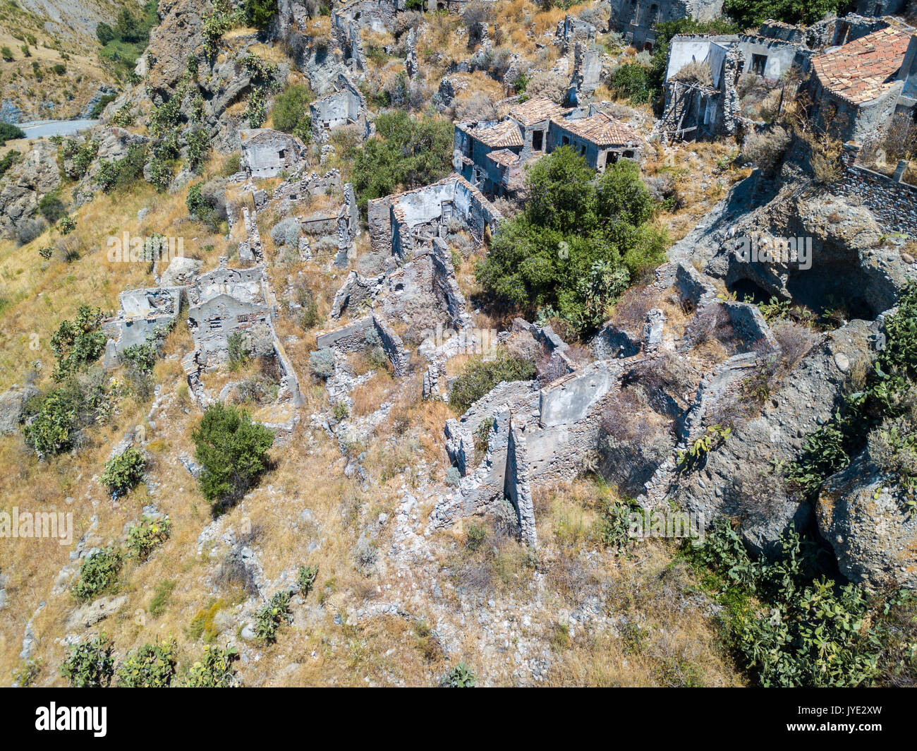 Aerial view of the Small village of Pentedattilo, church and ruins of ...