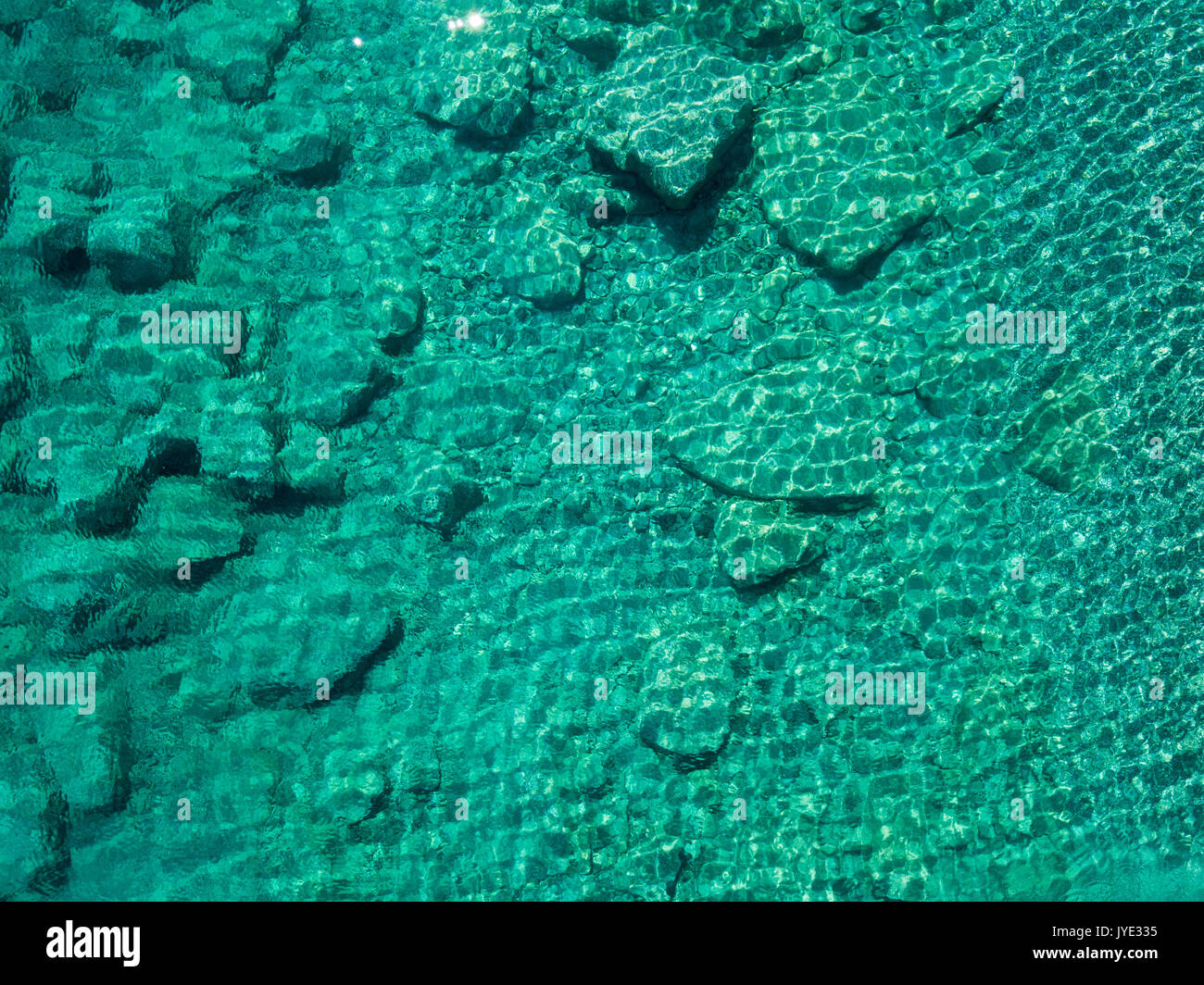 Aerial view of rocks on the sea. Overview of the seabed seen from above ...