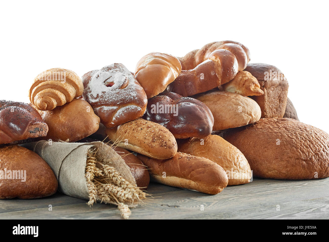 Assorted breads isolated on white Stock Photo - Alamy
