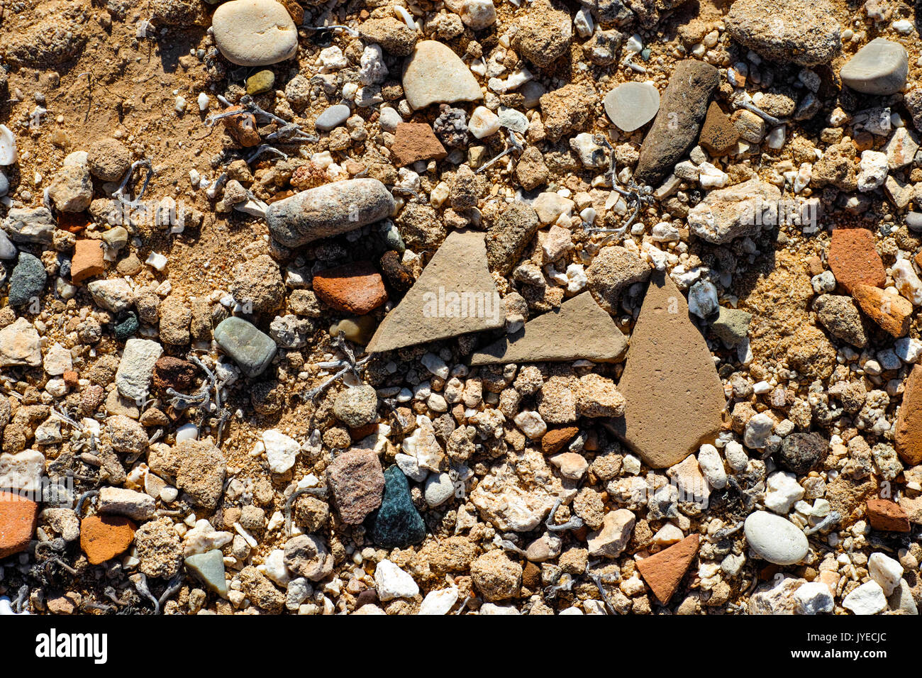 Background of sand with stones and pebbles. Close-up Stock Photo - Alamy