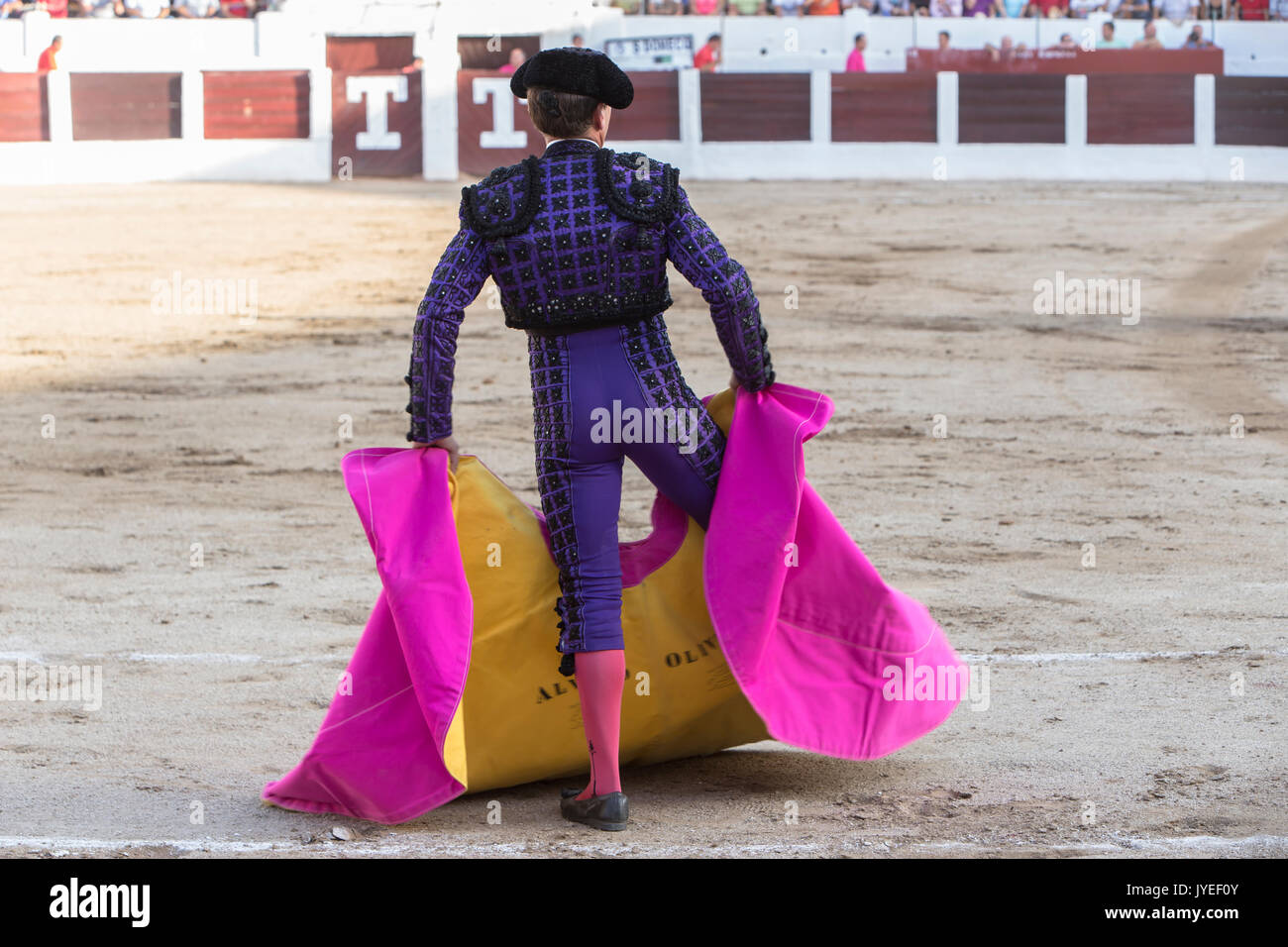 Spanish bullfighter holds Capote during Corrida de Toros, Linares ...