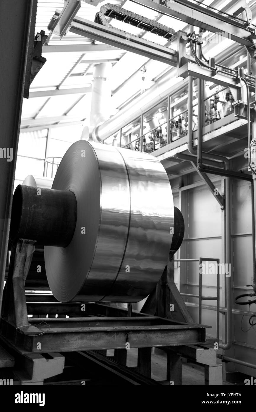 aluminum coils after heating process on iron table with a furnace on ...