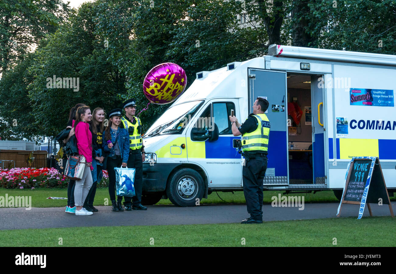 Policeman taking photograph festival hi-res stock photography and ...