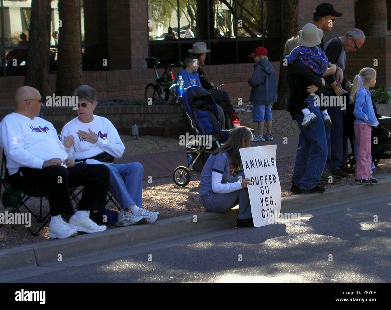 A single minder, ignored protester at the Parado del Sol parade. There ...